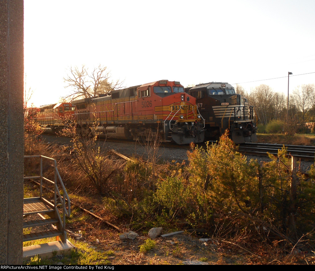 NS 8457 and BNSF 5026 & HLCX 7843